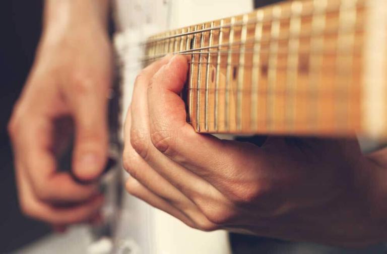 Why Is The G String Always Out Of Tune? (Mystery Solved!) | GuitarNiche